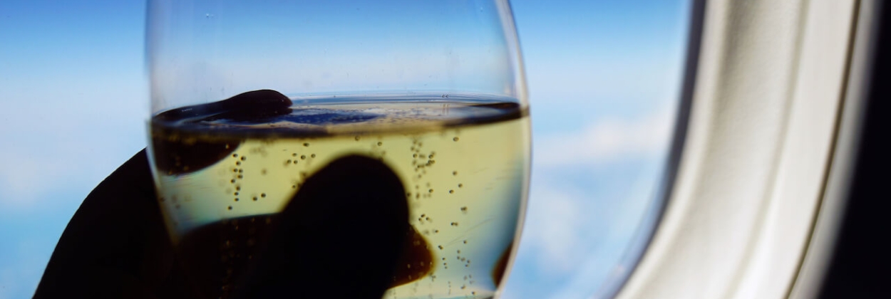 American Airlines Replaces Champagne with Sparkling Wine in First and ...